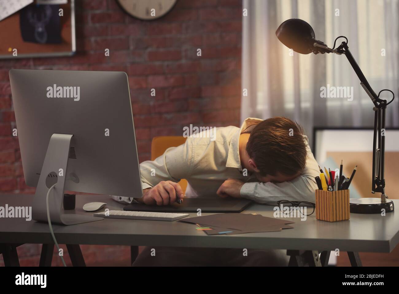 Man sleeping keyboard in computer hi-res stock photography and images ...