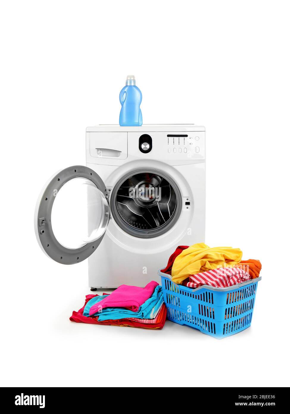 Washing machine and clothes on white background Stock Photo - Alamy