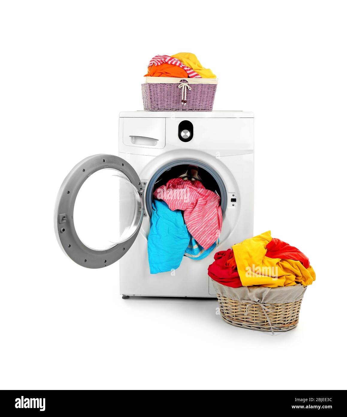 Clothes in washing machine on white background Stock Photo - Alamy