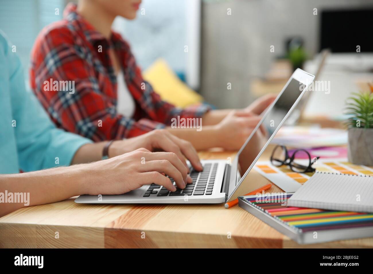 Male hands on laptop keyboard Stock Photo - Alamy