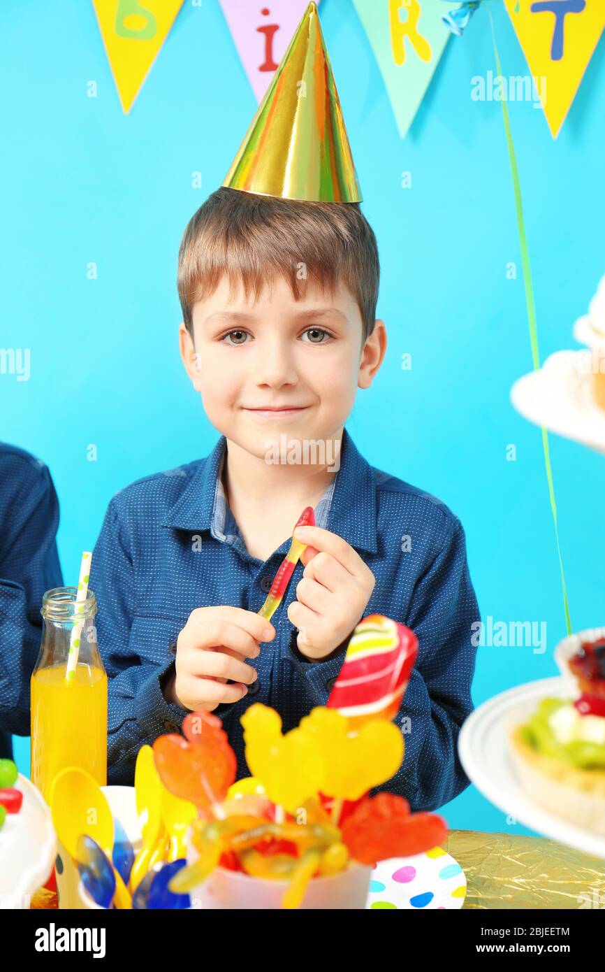 Cute little boy celebrating birthday at home Stock Photo - Alamy