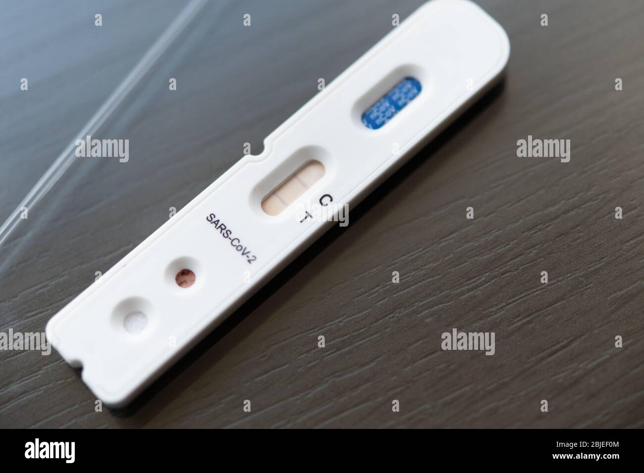 Positive test result by using rapid test device for COVID-19 Stock ...