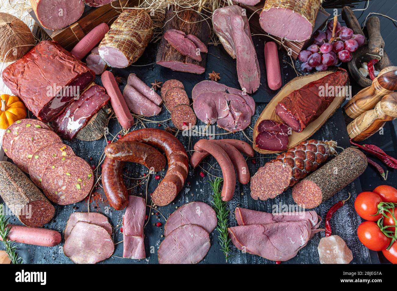 Smoked meat products. Display meats, cold cuts and sausages in a ...