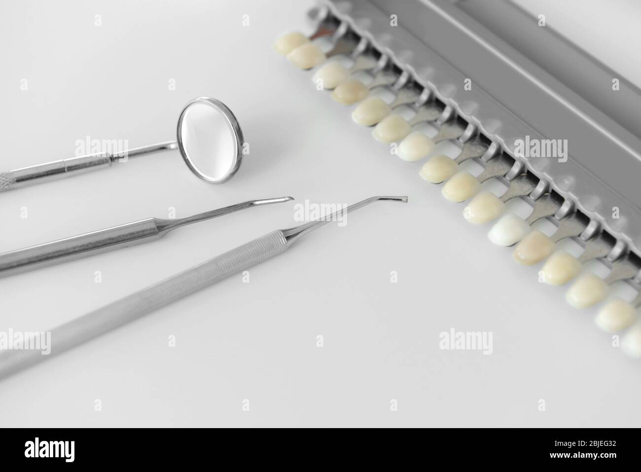 Dentist equipment on white table Stock Photo - Alamy