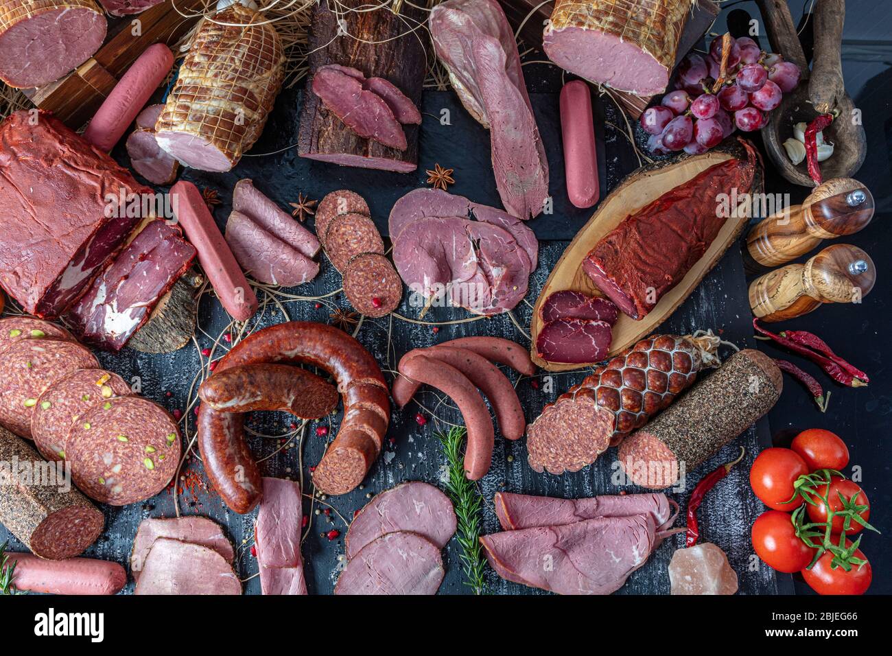Smoked meat products. Display meats, cold cuts and sausages in a ...
