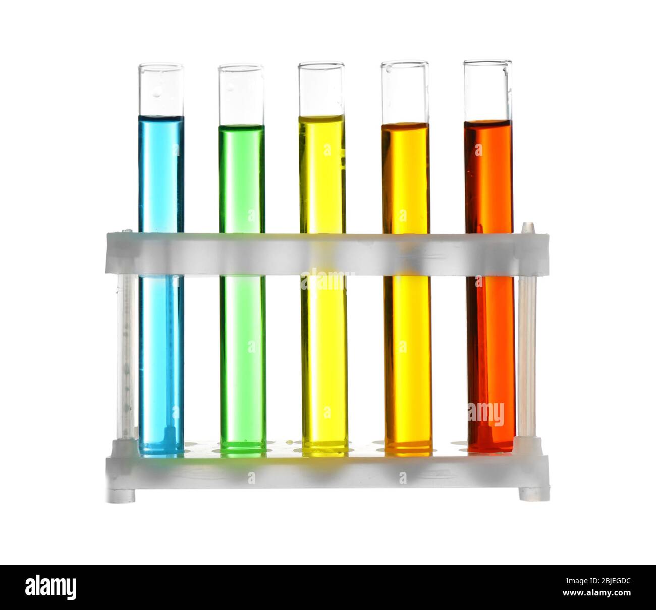 Test tubes with colourful samples on stand isolated on white Stock ...
