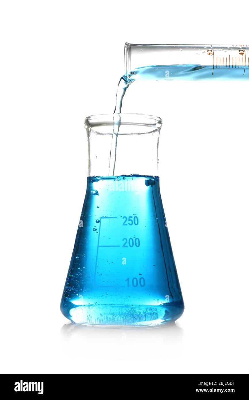 Pouring blue sample into a test flask on white background Stock Photo ...