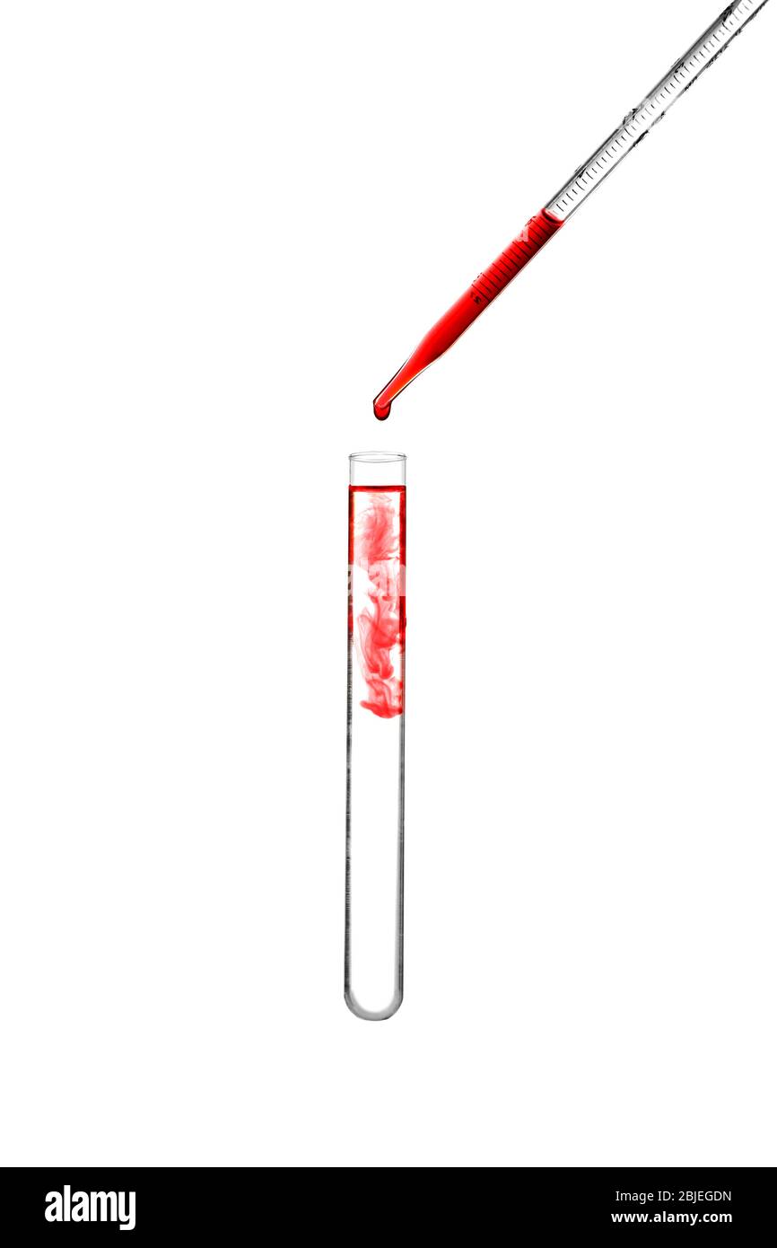 Pipette dropping a sample into a test tube on white background Stock ...
