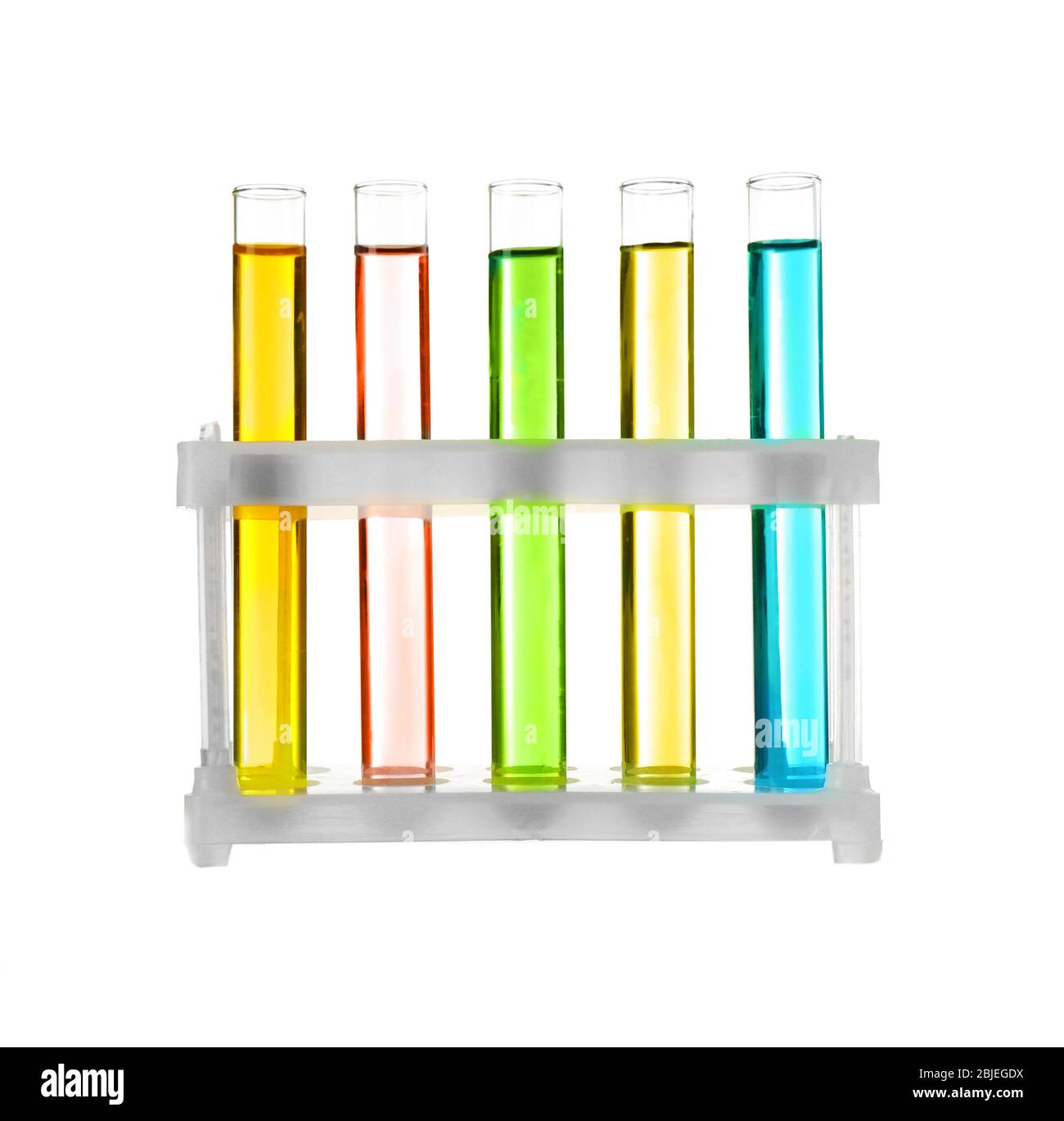 Test tubes with colourful samples on stand isolated on white Stock ...