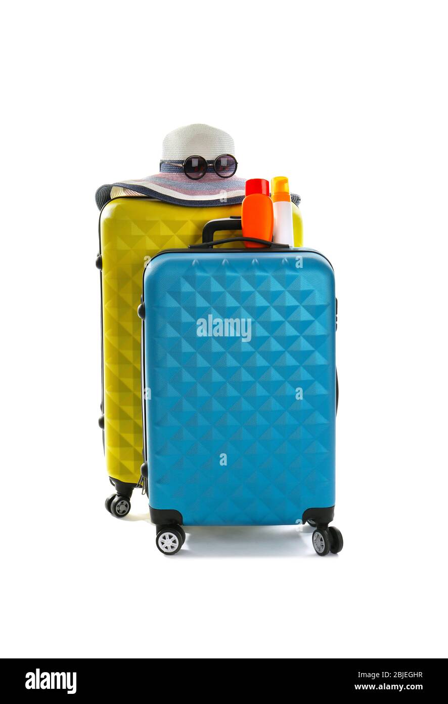 Modern suitcase with beach set isolated on white Stock Photo - Alamy
