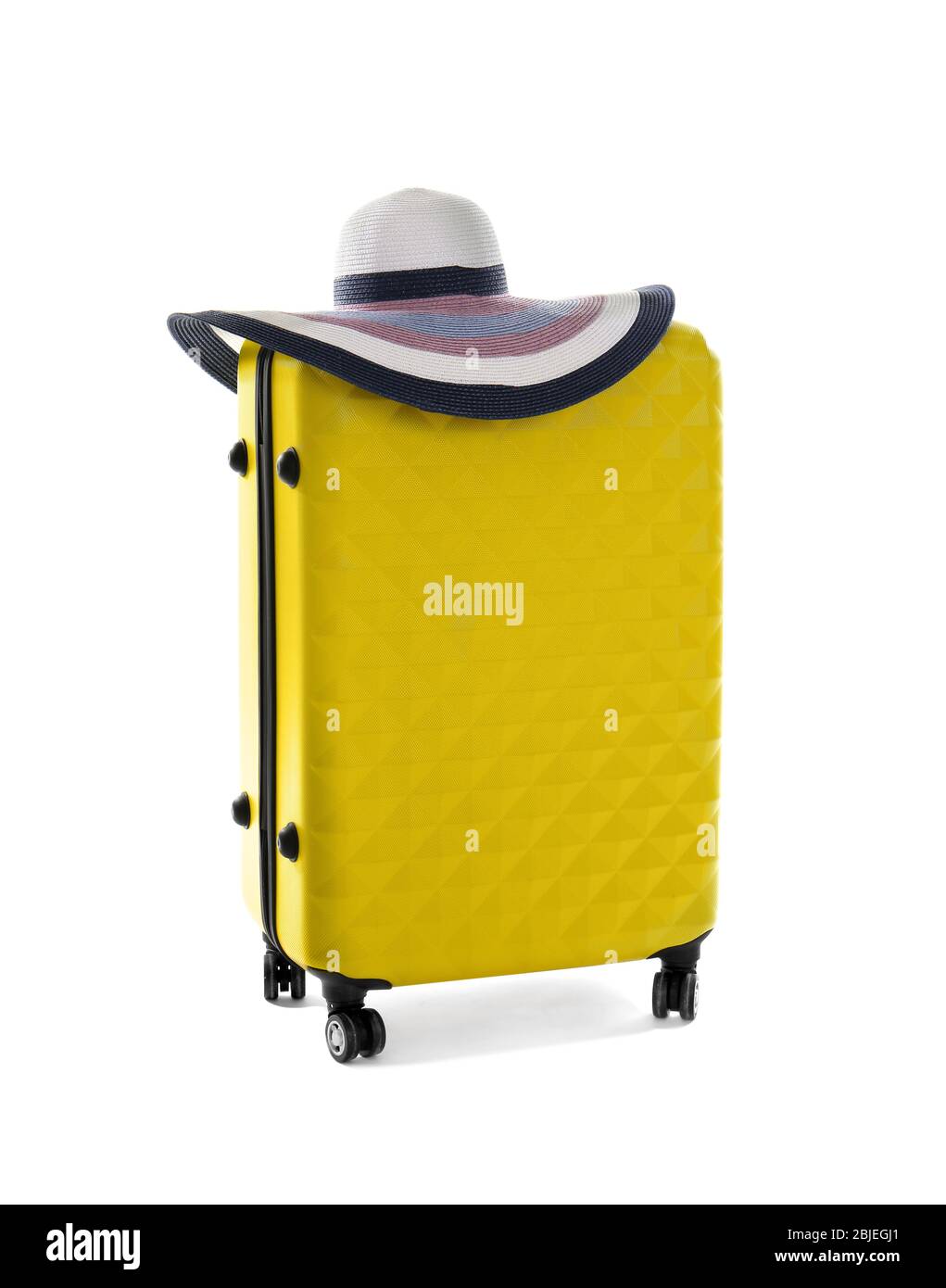 Modern suitcase and hat isolated on white Stock Photo - Alamy