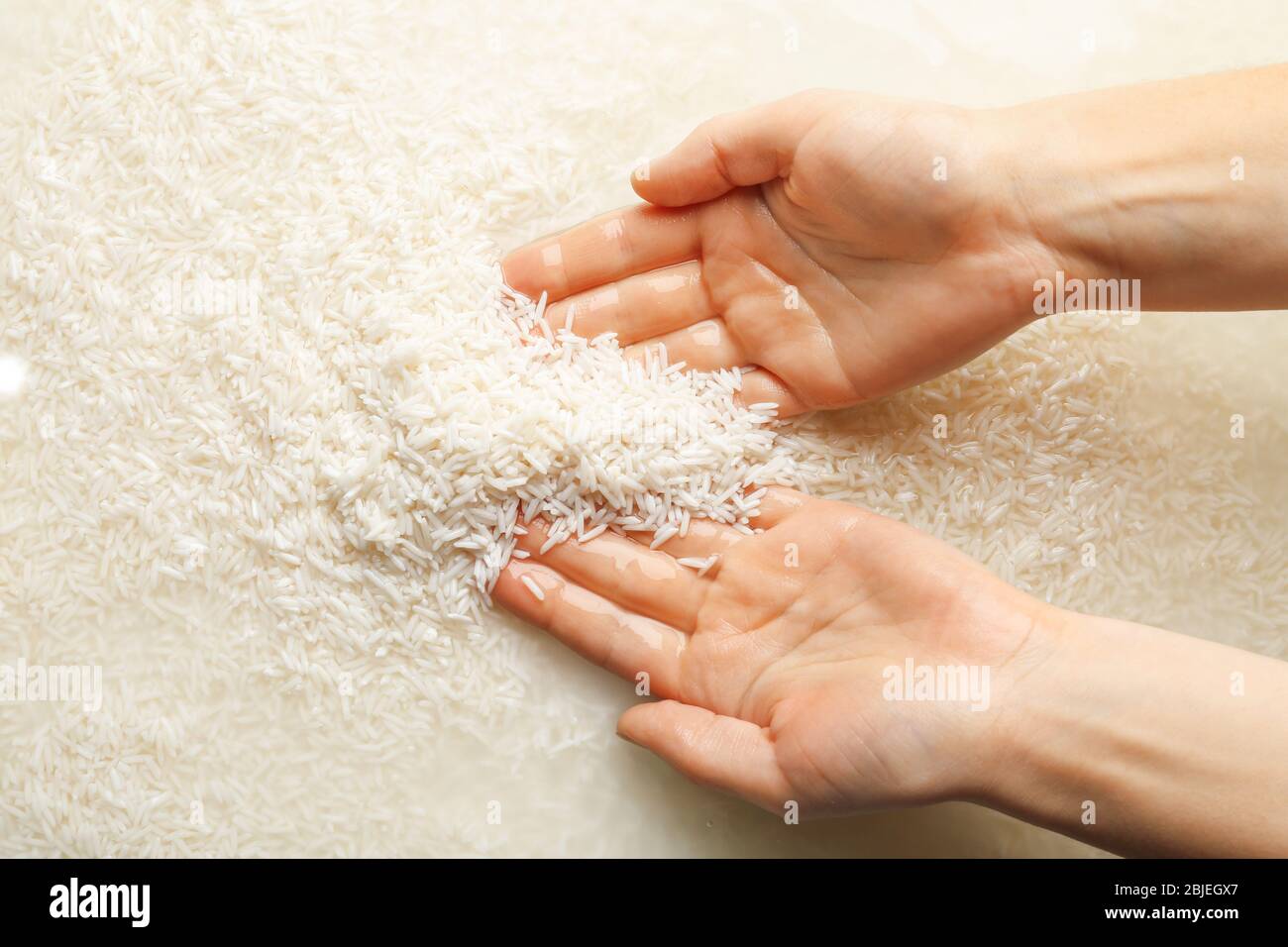 Rice washing water hi-res stock photography and images - Alamy