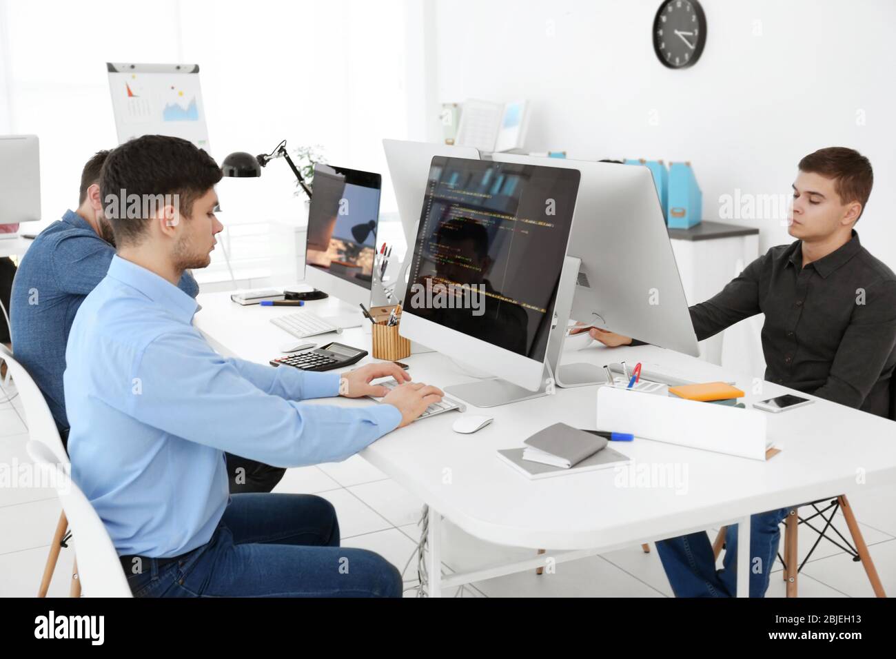 Young people software programmers hi-res stock photography and images ...