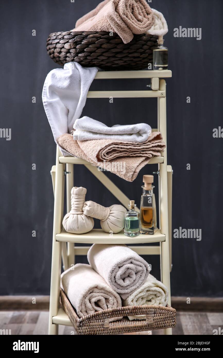 Ladder shelves with spa stuff Stock Photo - Alamy