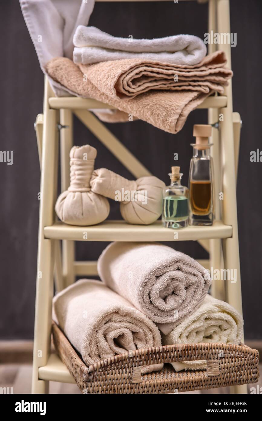 Ladder shelves with spa stuff Stock Photo - Alamy