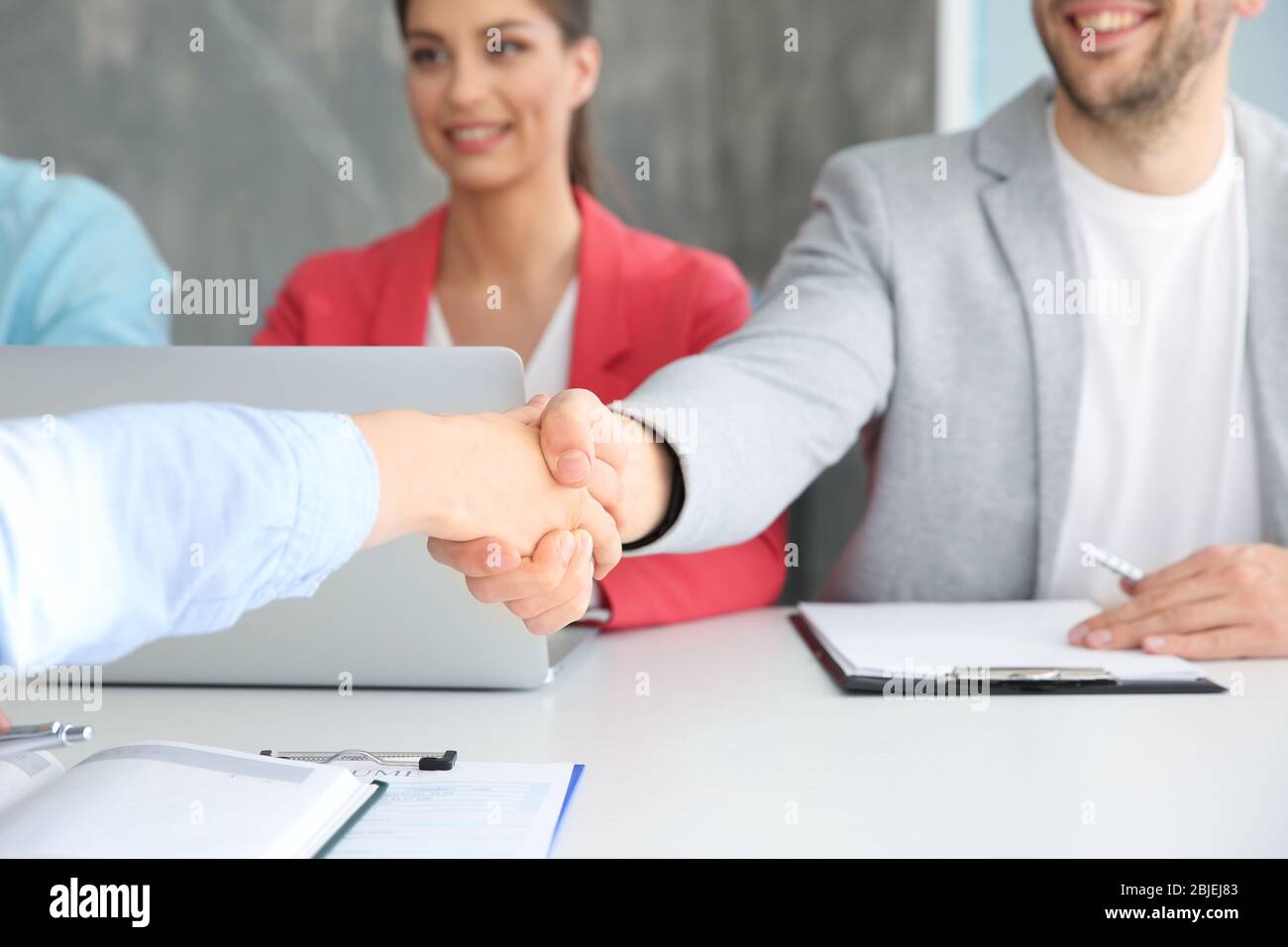Job interview concept. HR manager shaking female hand in office Stock ...