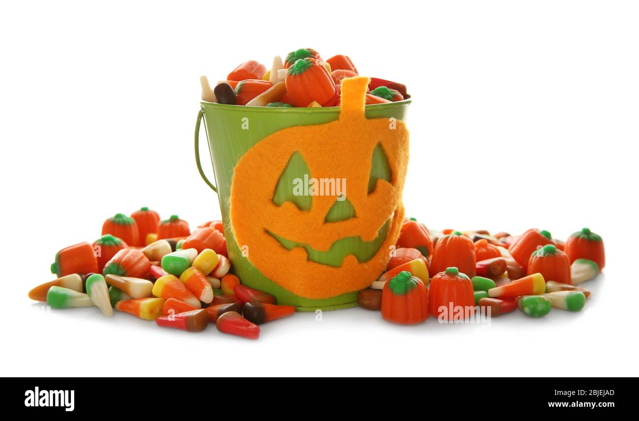 Heap of assorted jelly sweets in bucket on white background Stock Photo ...