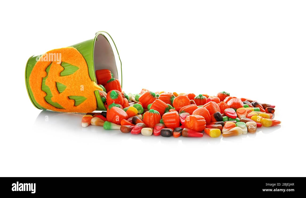 Heap of assorted jelly sweets in bucket on white background Stock Photo ...
