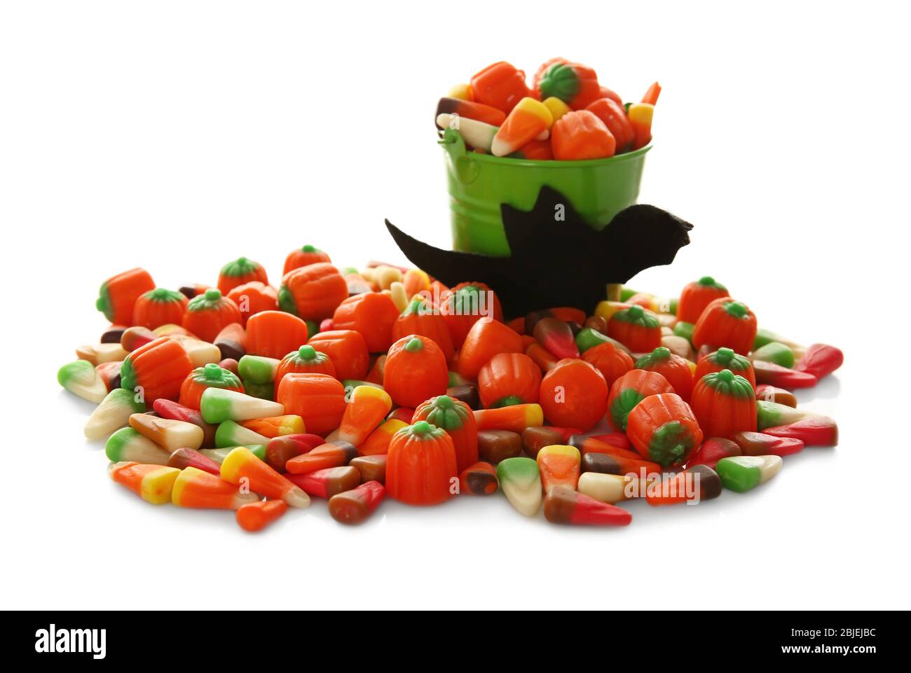 Heap of assorted jelly sweets in bucket on white background Stock Photo ...
