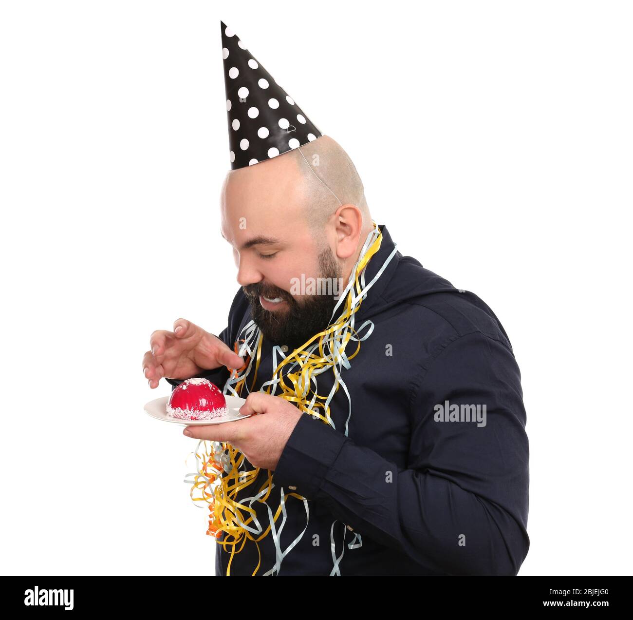 Funny fat man with tasty cake and party hat on white background Stock ...