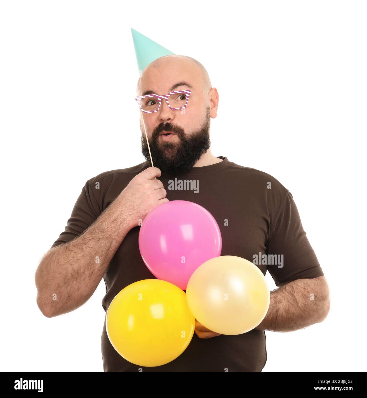 Funny fat man with party hat and colorful balloons on white background ...