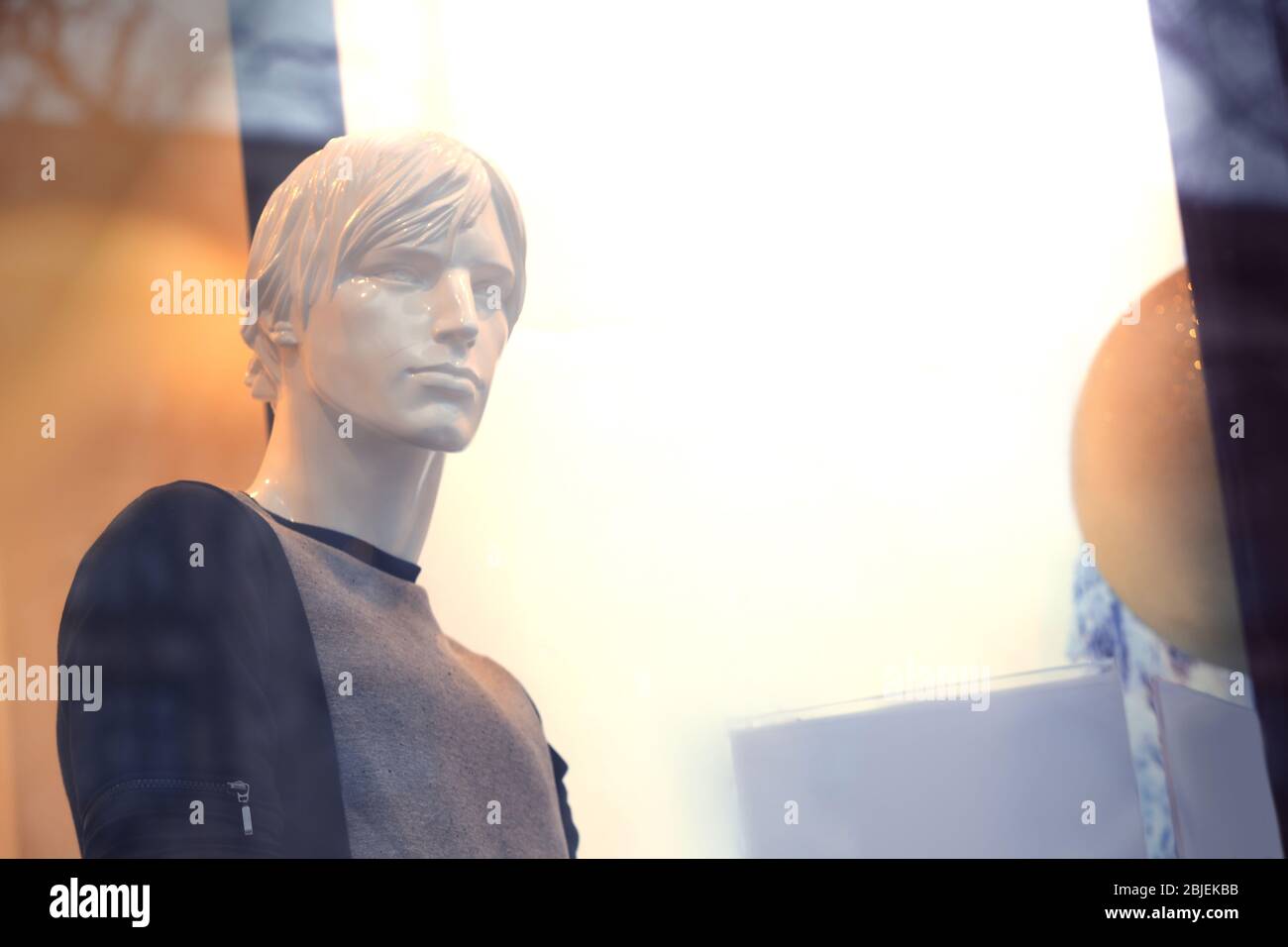 Mannequin in shop window Stock Photo - Alamy