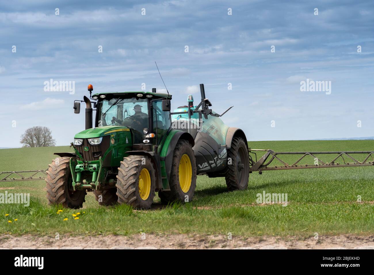 Spraying winter wheat crop in spring using a Berthoud trailed sprayer ...