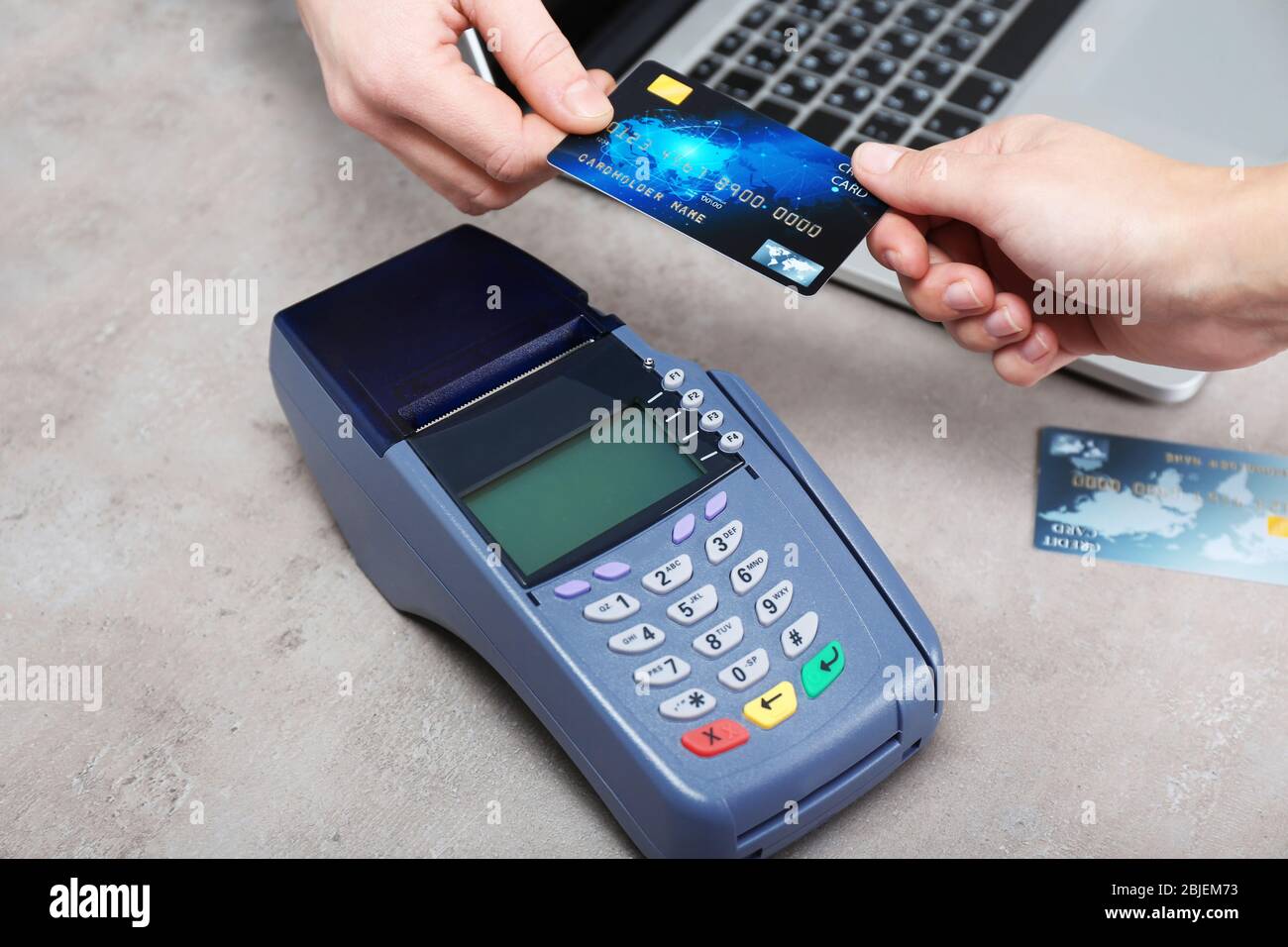 Payment operation with credit card and terminal Stock Photo - Alamy