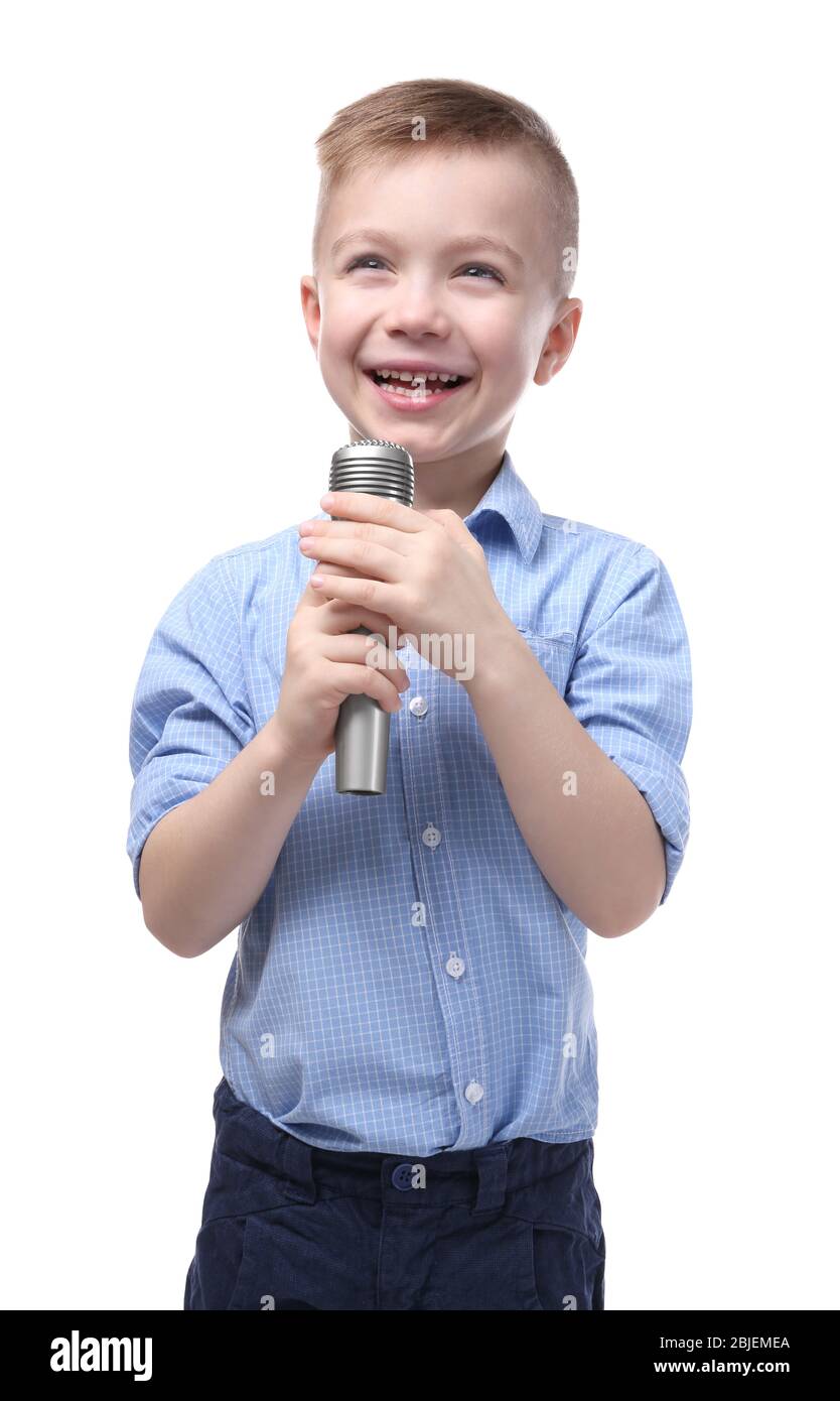 Cute little boy with microphone on white background Stock Photo - Alamy