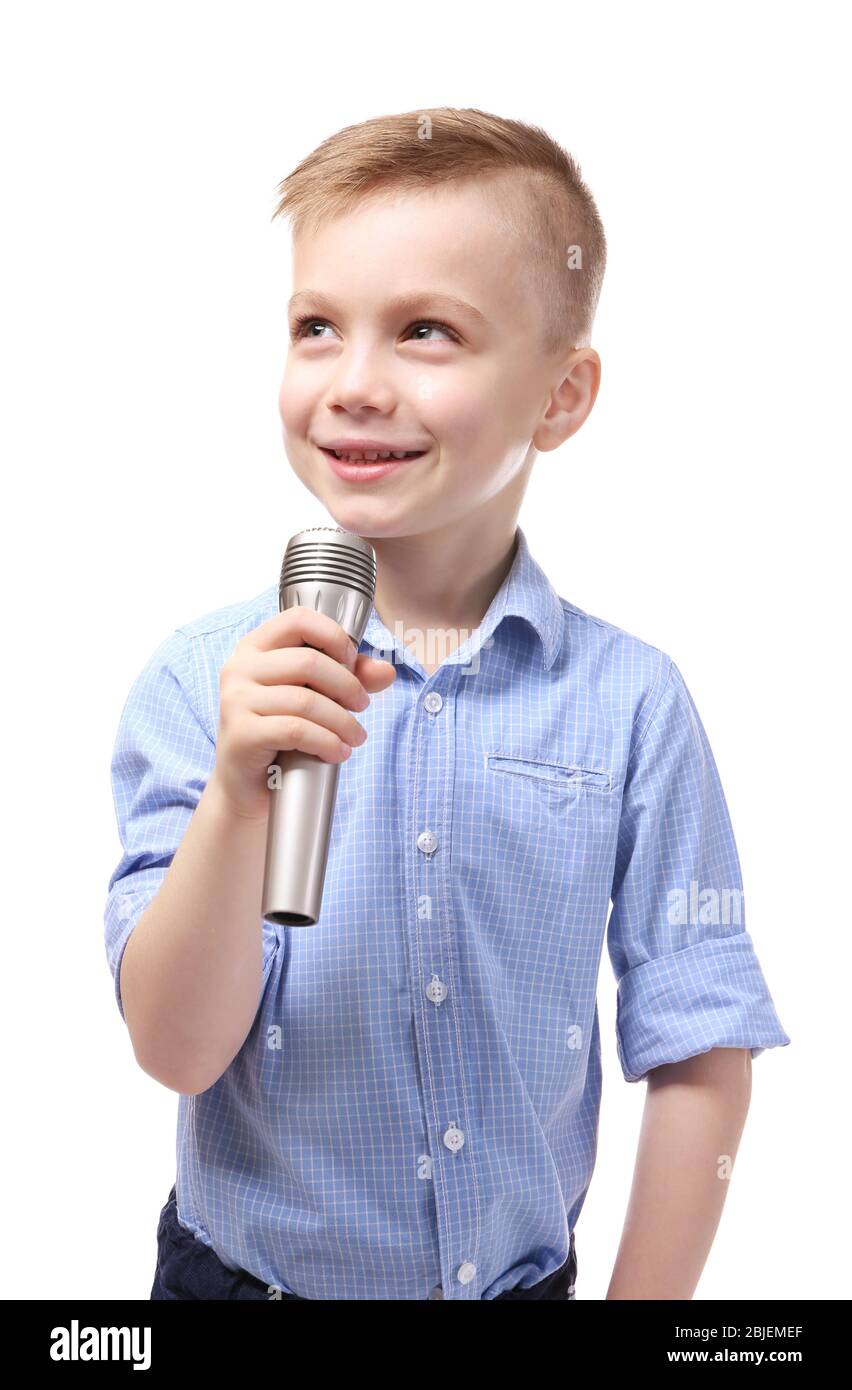 Cute little boy with microphone on white background Stock Photo - Alamy
