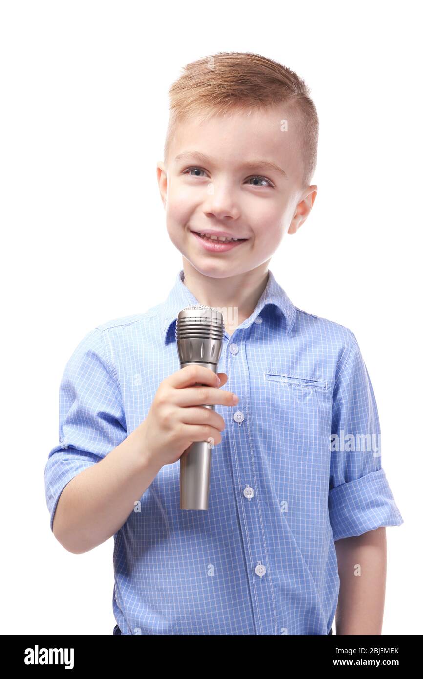 Cute little boy with microphone on white background Stock Photo - Alamy