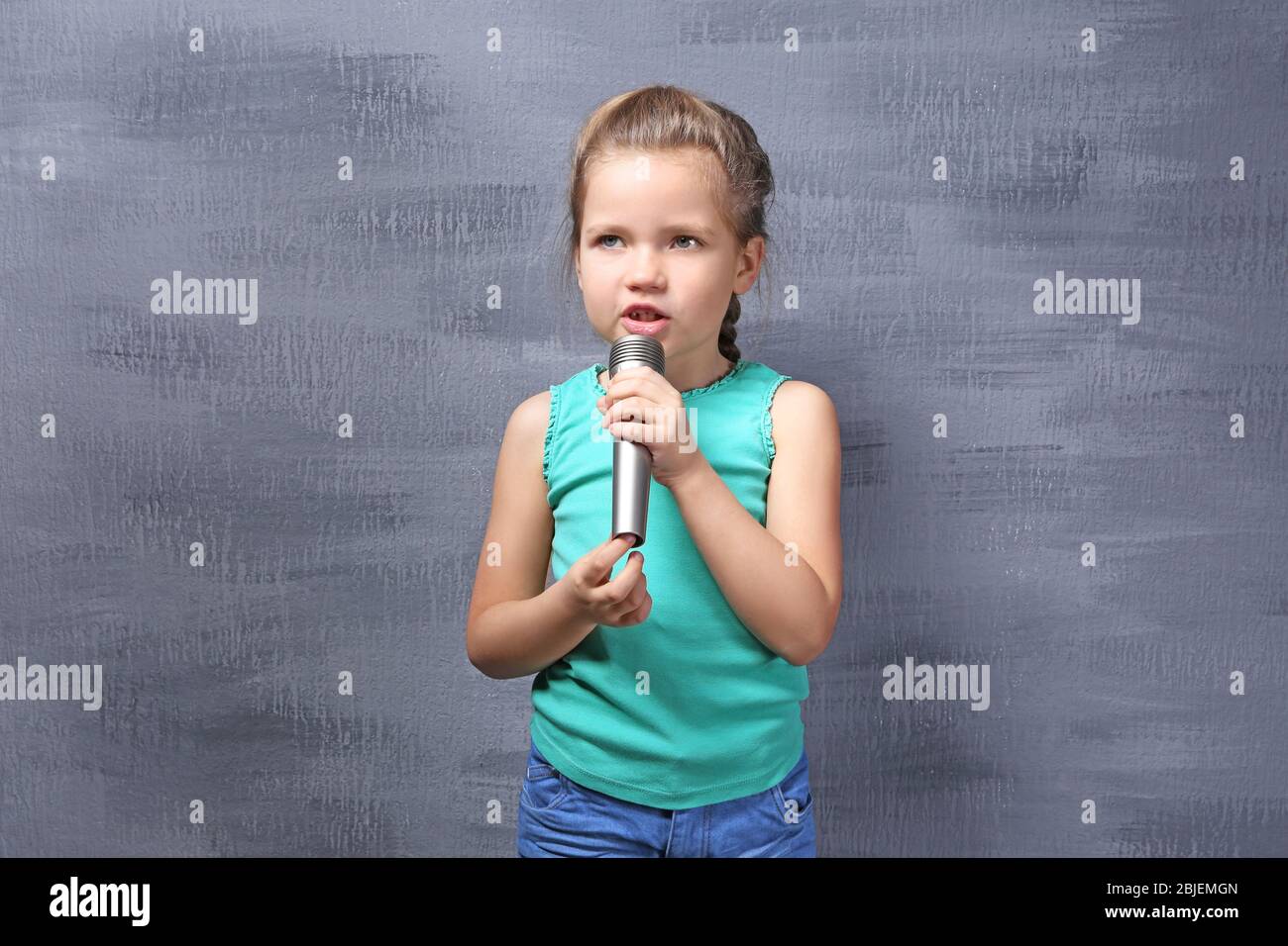 Child interview mic hi-res stock photography and images - Alamy