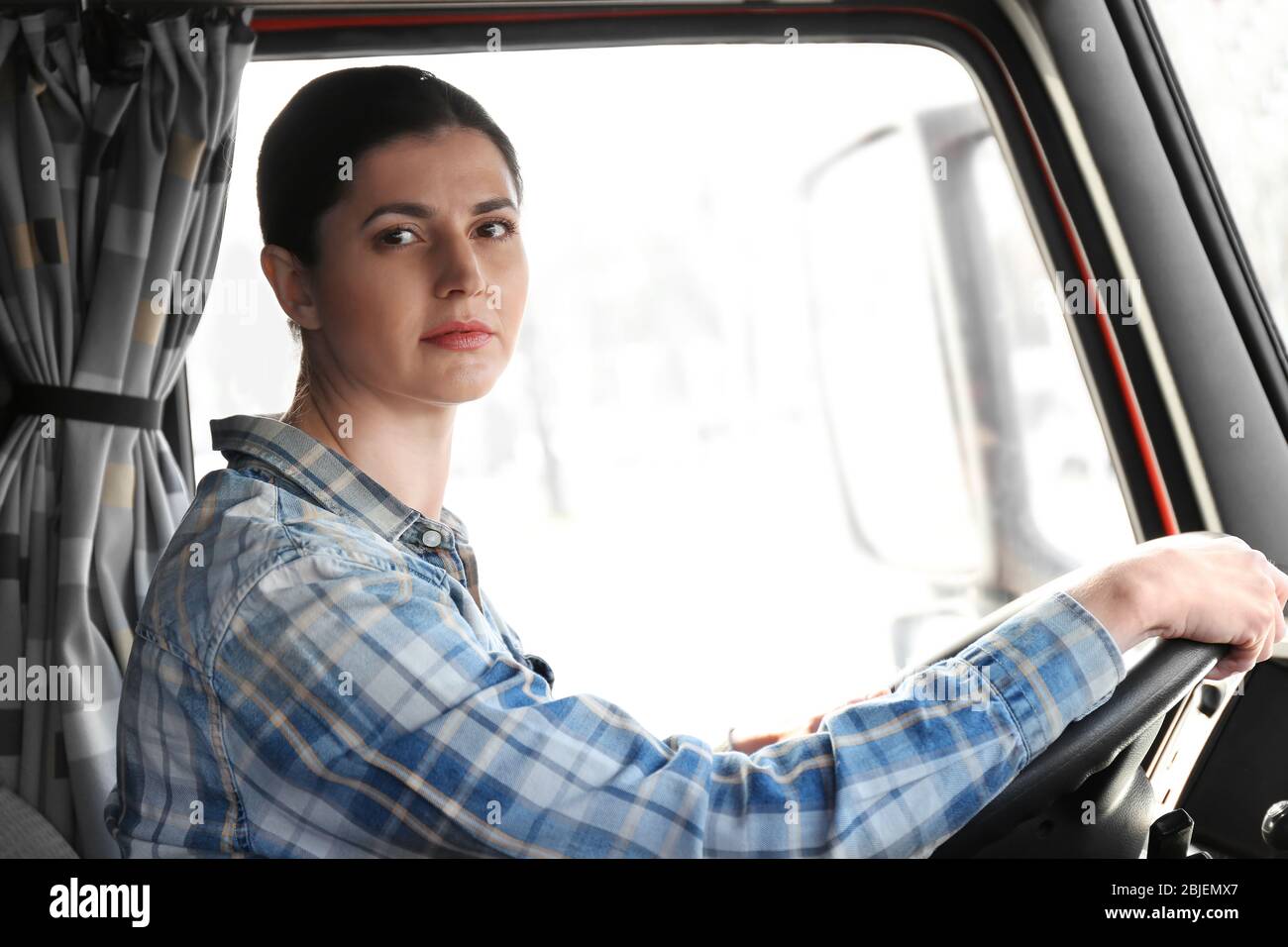 Female sitting in trailer hi-res stock photography and images - Alamy