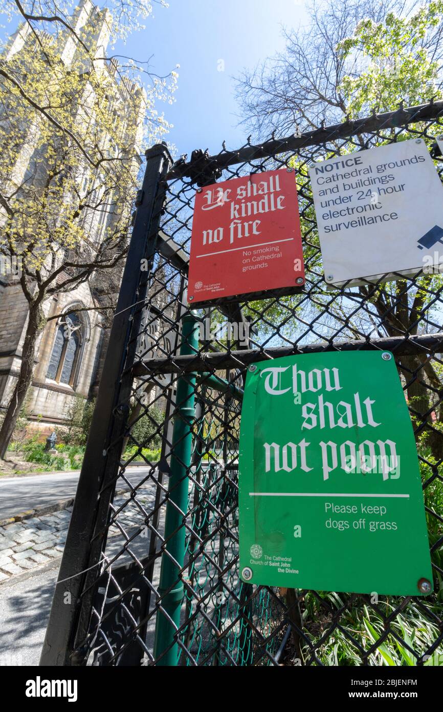a humorous sign posted at the entrance to the Cathedral of St. John the ...