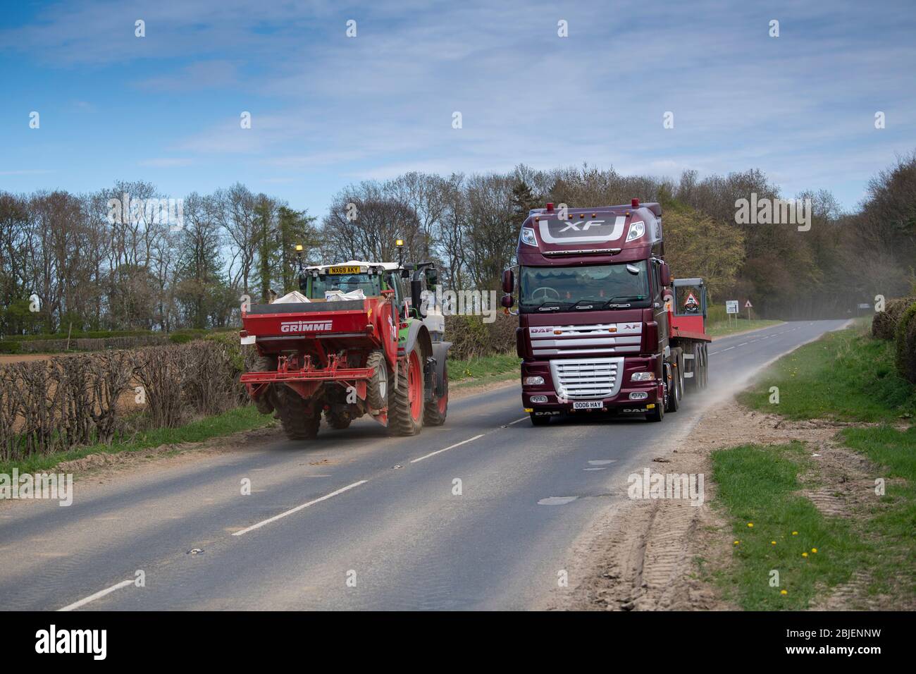 Road traffic slow moving tractor hi-res stock photography and images ...
