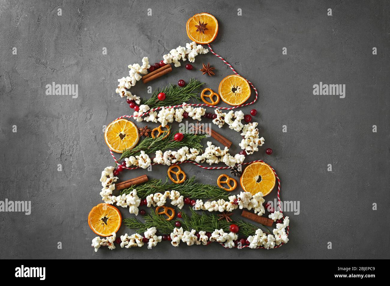 Christmas decorations in shape of tree Stock Photo - Alamy