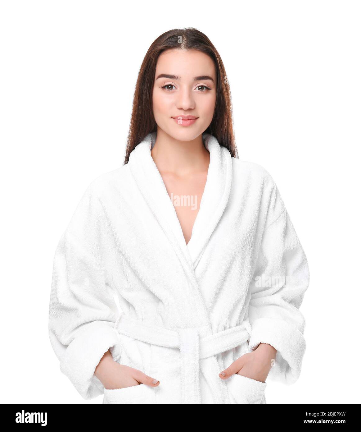 Beautiful young woman in bathrobe on white background Stock Photo - Alamy