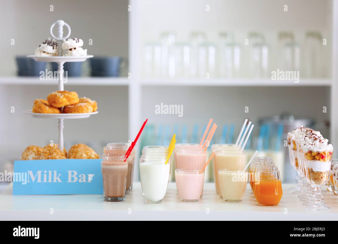 Desserts and different drinks in milk bar Stock Photo - Alamy