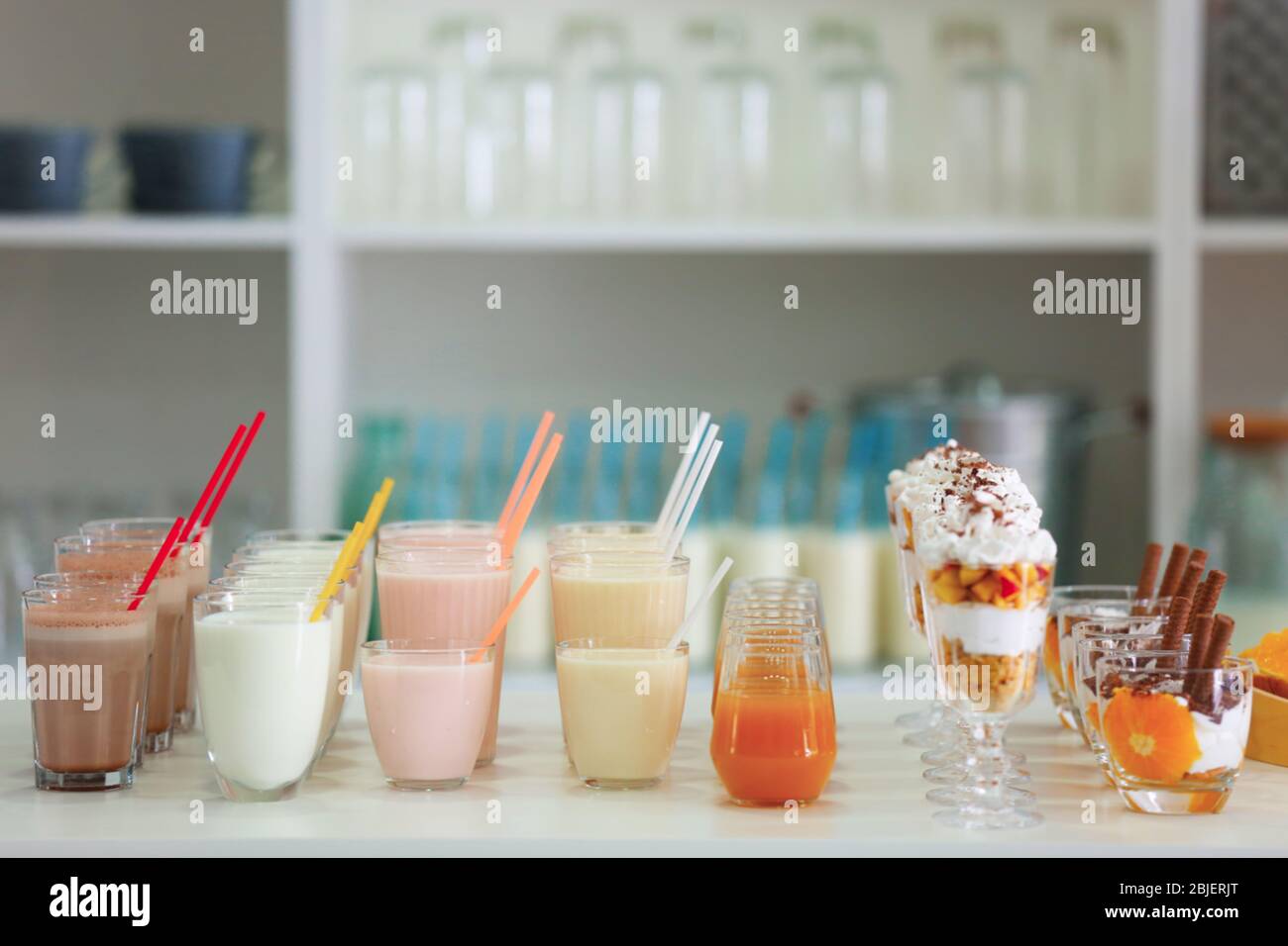 Desserts and different drinks in milk bar Stock Photo - Alamy