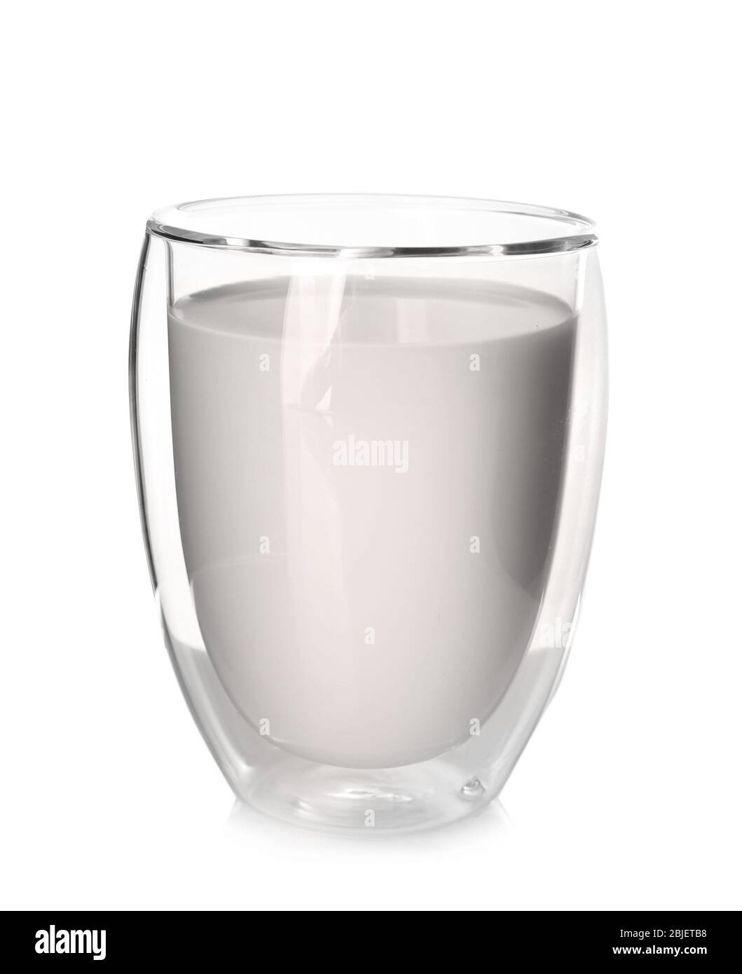 Cup of milk on white background Stock Photo - Alamy