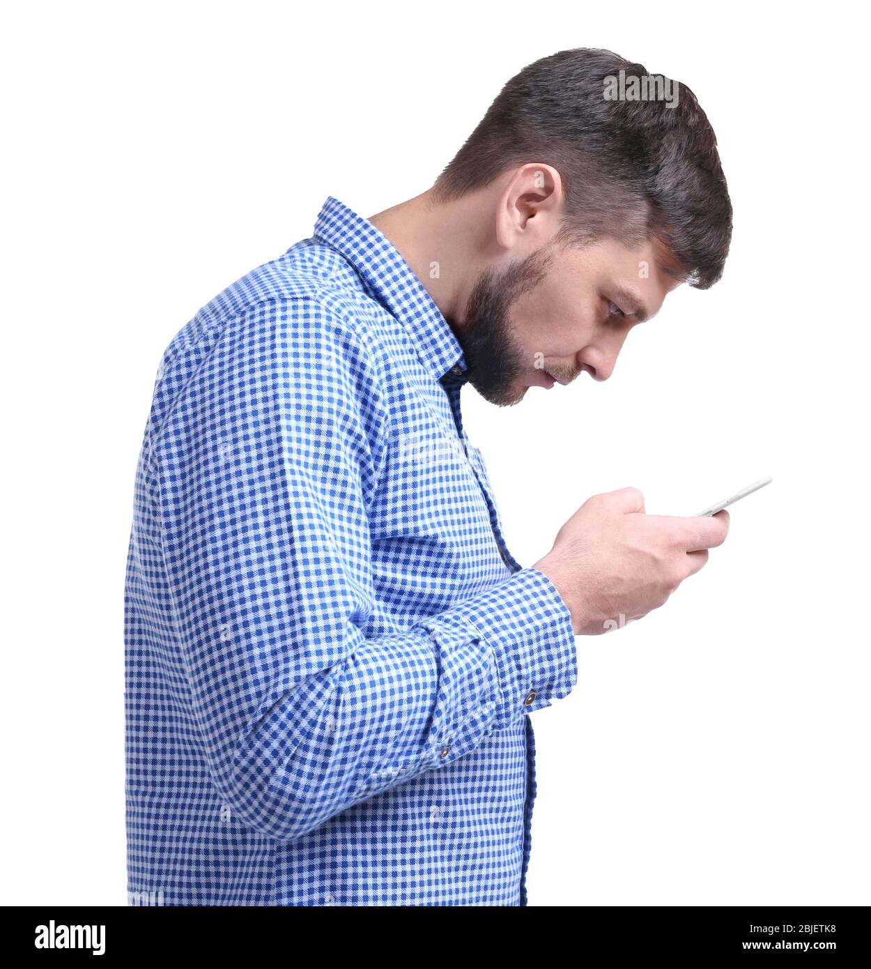 Posture concept. Man using smartphone against white background Stock ...