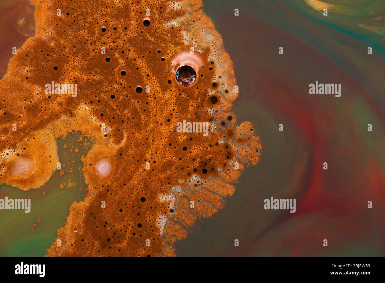 Color spot with bubbles. Mixed natural colors. Multi-colored waves ...