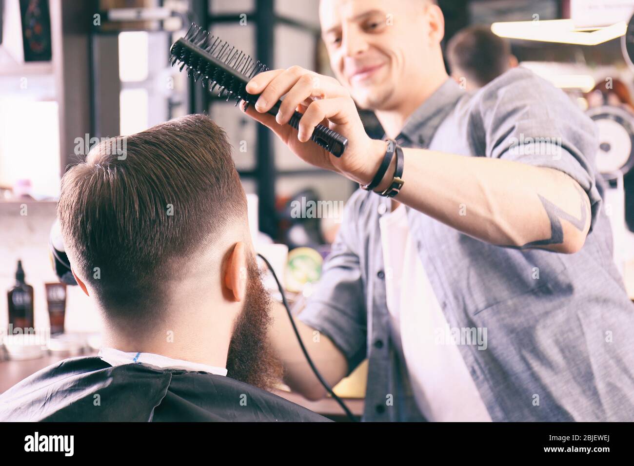 Barber making hi-res stock photography and images - Alamy