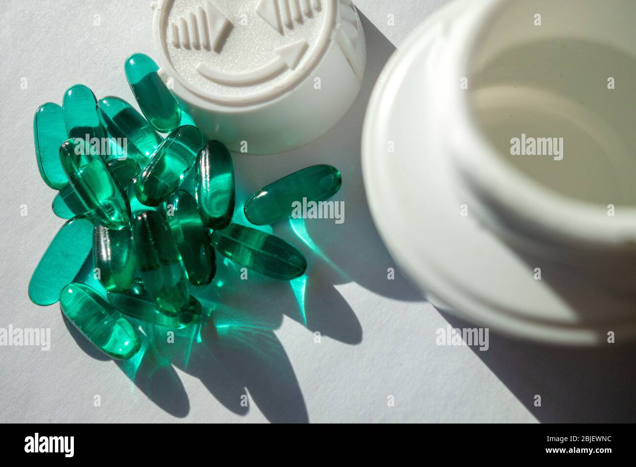 Clear teal blue gel capsules hi-res stock photography and images - Alamy