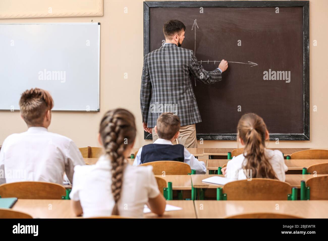 Black preteen boy listening hi-res stock photography and images - Alamy