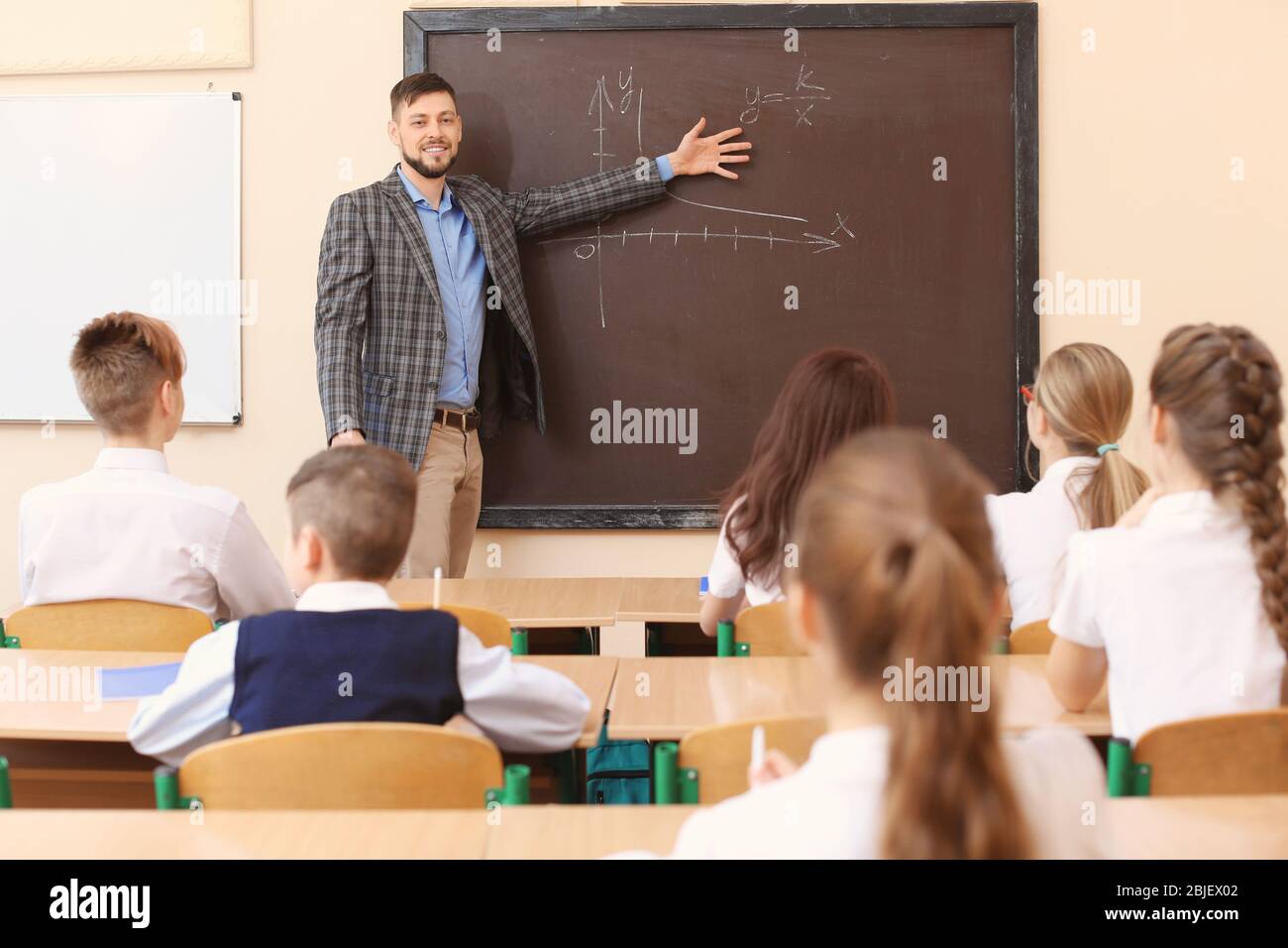 Black preteen boy listening hi-res stock photography and images - Alamy