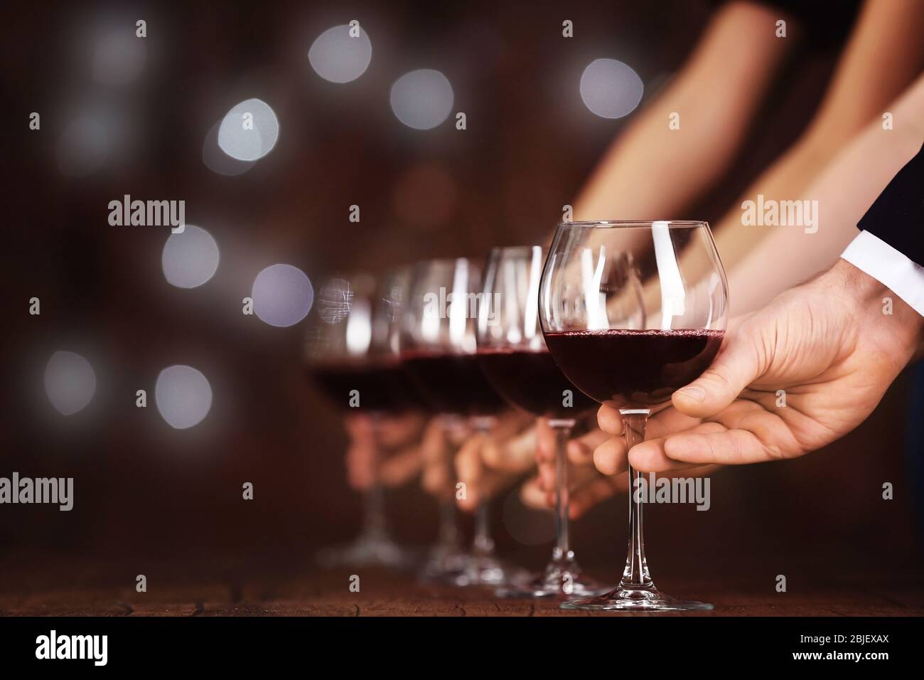 Man hand taking glass alcohol hi-res stock photography and images - Alamy