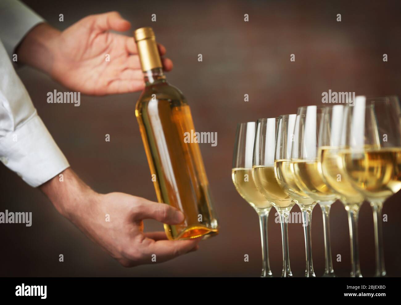 Person of color serving wine hi-res stock photography and images - Alamy