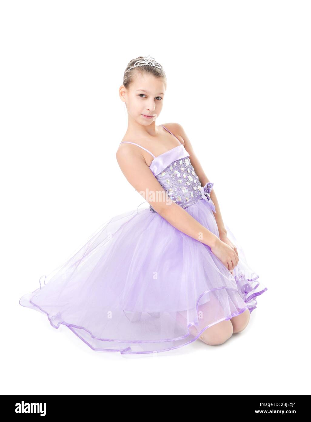 Cute little dancer on white background Stock Photo - Alamy