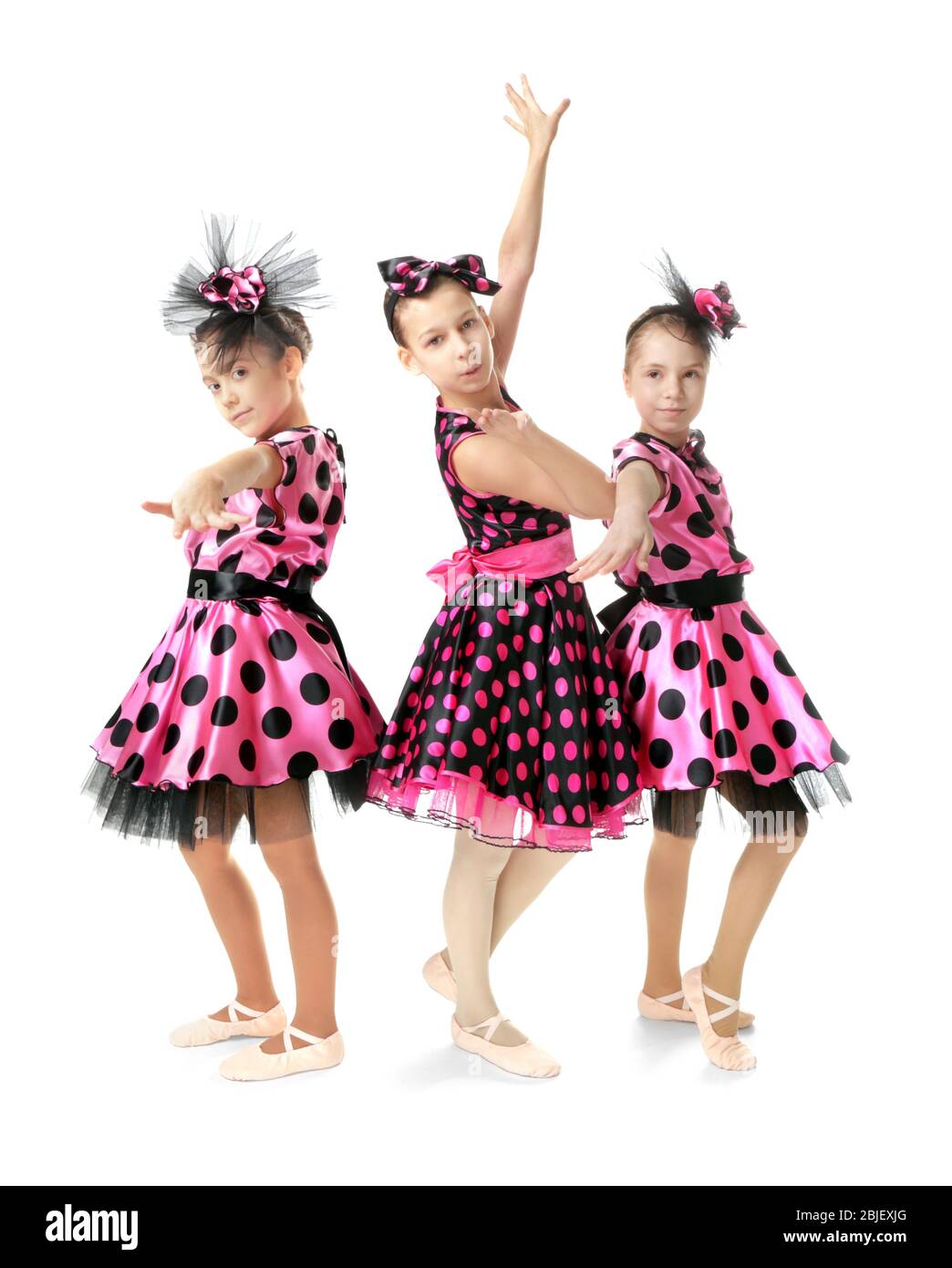 Cute little dancers on white background Stock Photo - Alamy